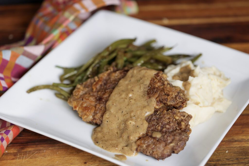 Crispy Country Fried Steak with Homemade Pepper Gravy - Food Fidelity